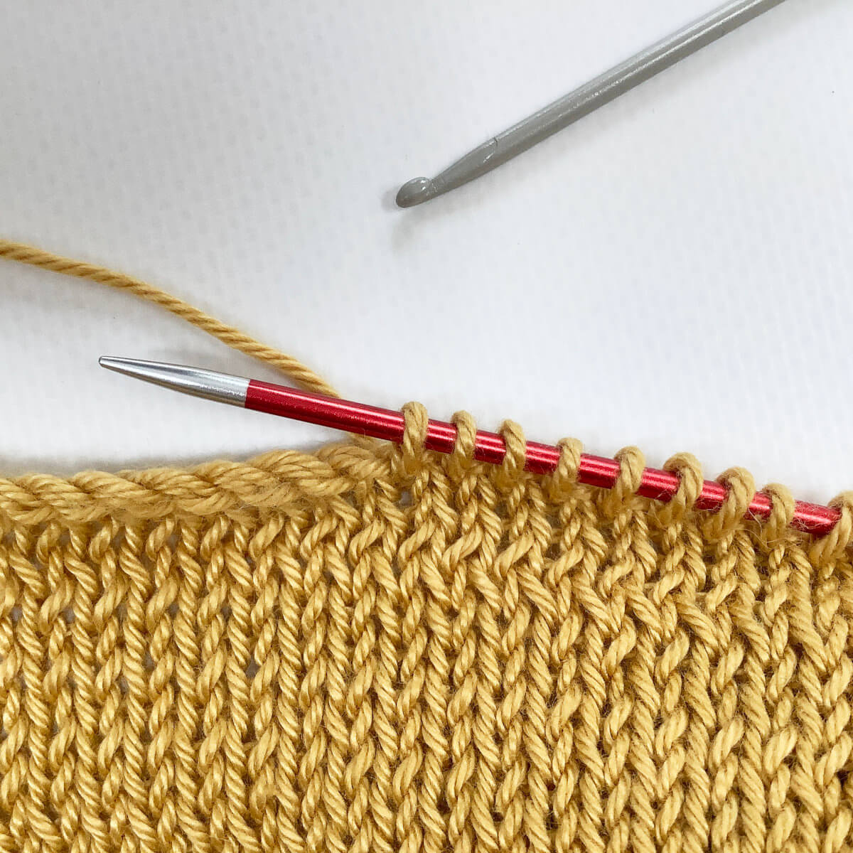 tutorial – picking up stitches to work a neckline - La Visch Designs